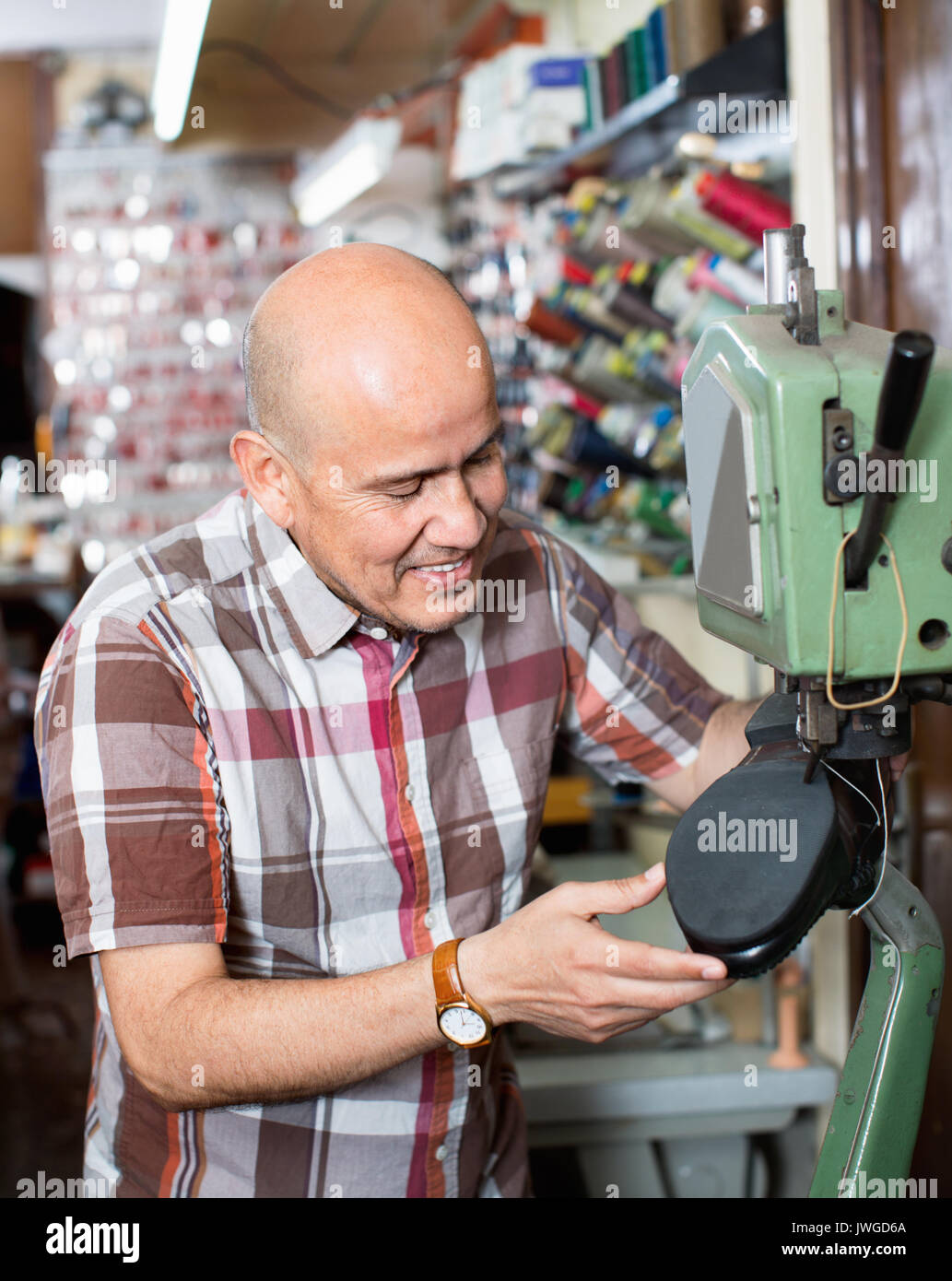 Machine stitching boots hi-res stock photography and images - Alamy