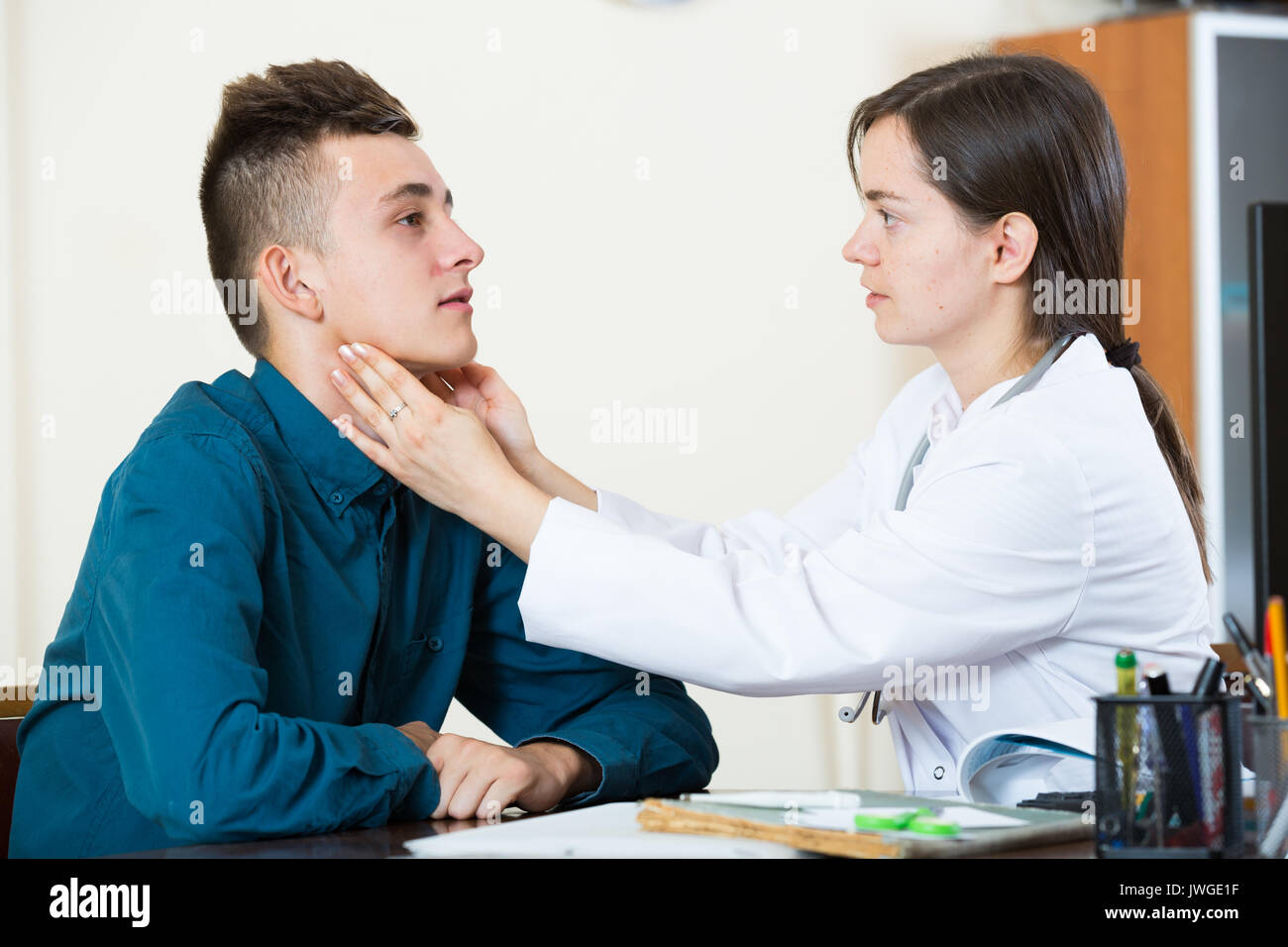 Teen boy doctor consultation clinic hi-res stock photography and images - Alamy
