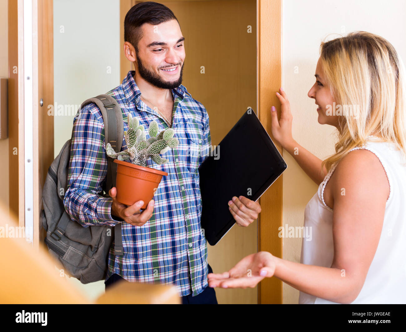 Excited female guest hi-res stock photography and images - Alamy
