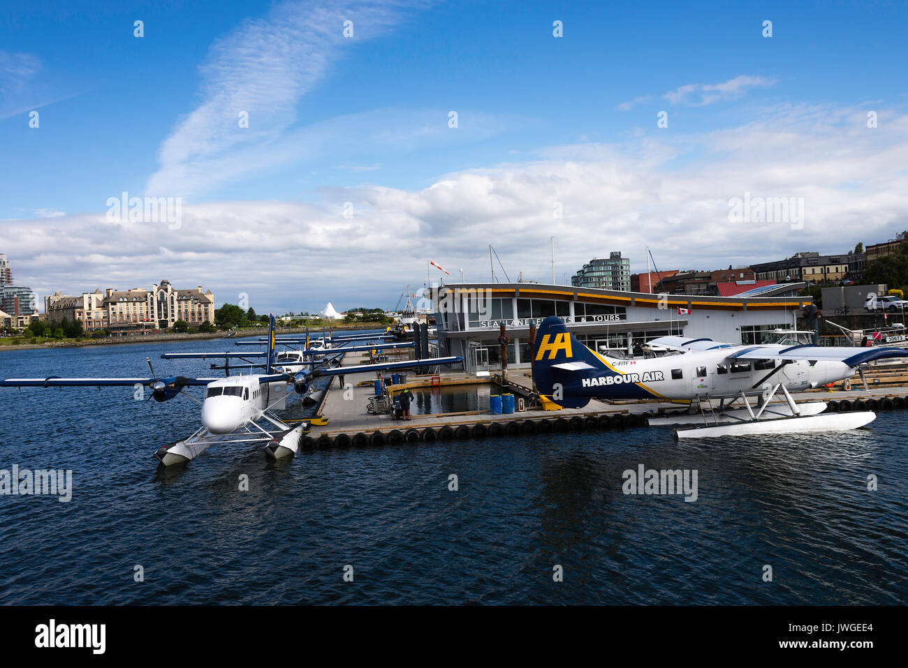 Colourful Seaplanes in the Inner Harbour Area of Victoria with Boats ...