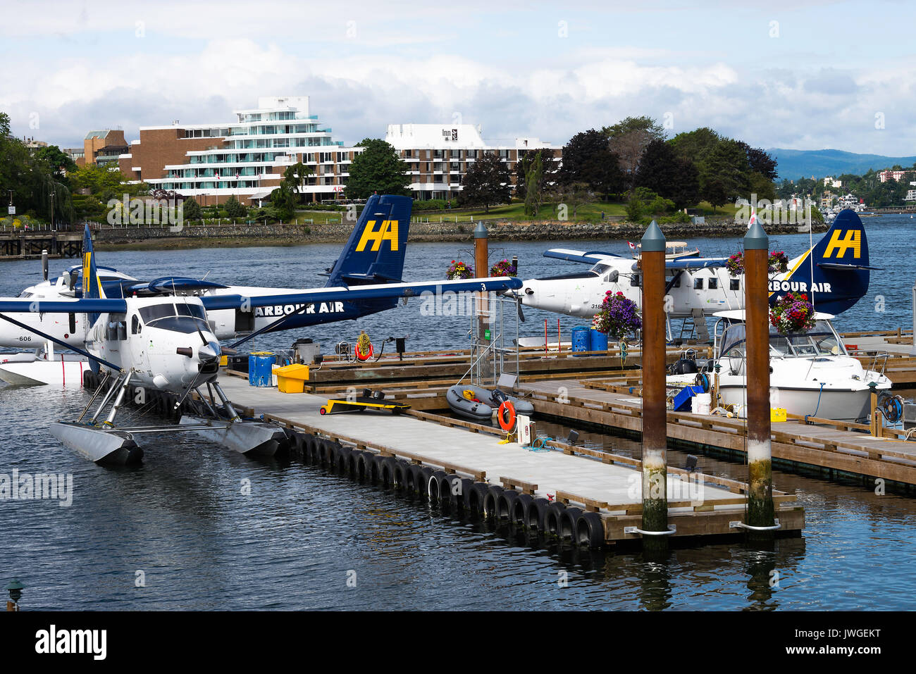 Colourful Seaplanes in the Inner Harbour Area of Victoria with Boats ...