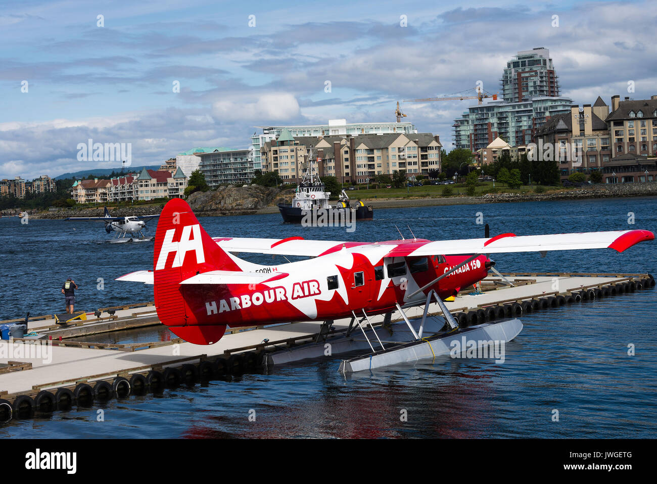 Colourful Seaplanes in the Inner Harbour Area of Victoria with Boats ...