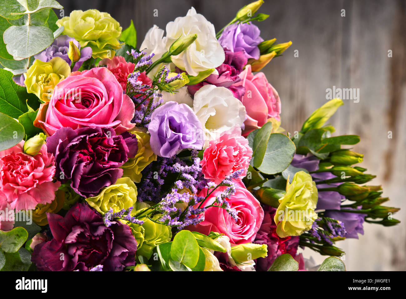Composition with bouquet of flowers Stock Photo - Alamy
