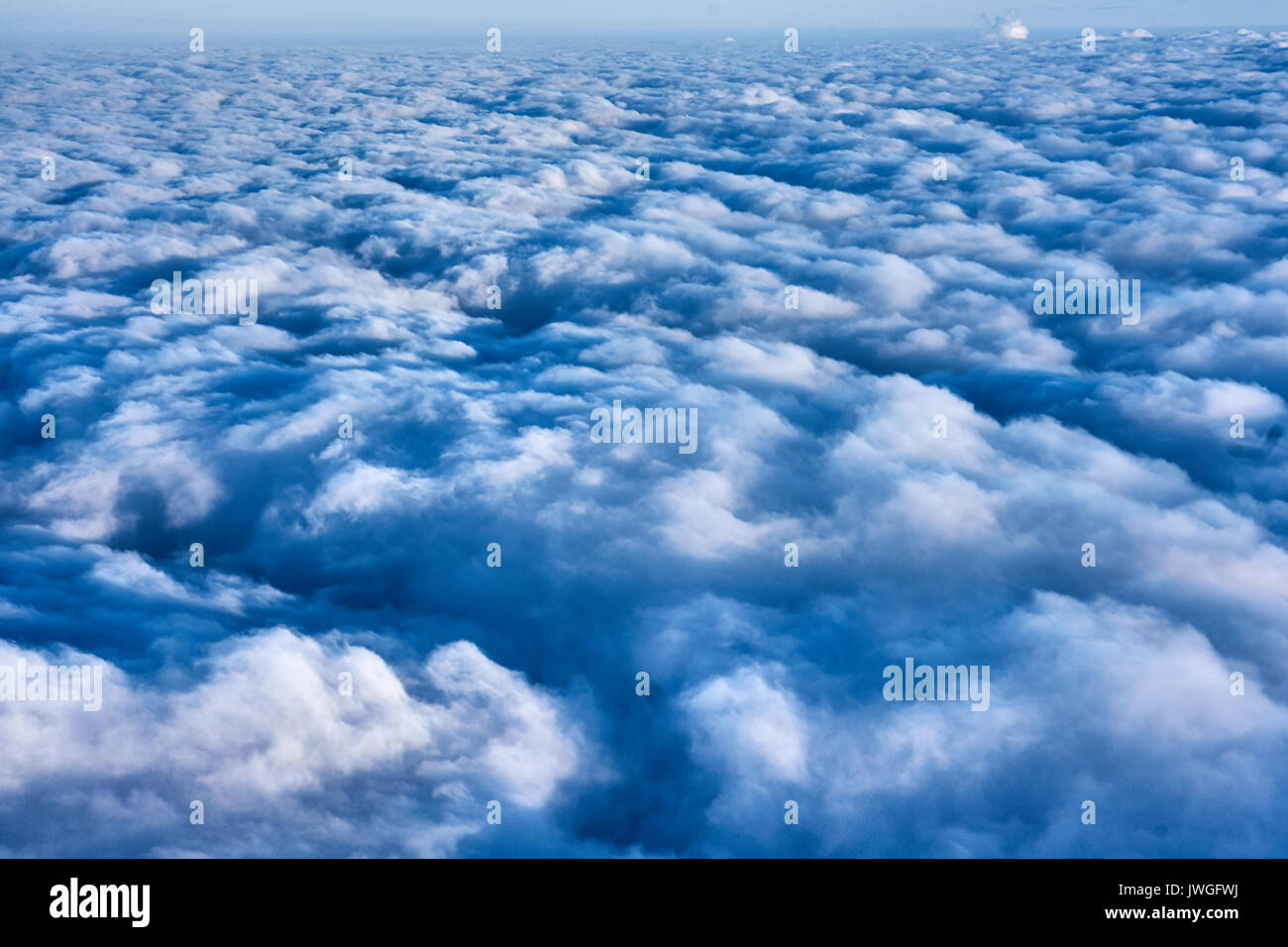 clouds and blue sky seen from airplane Stock Photo - Alamy