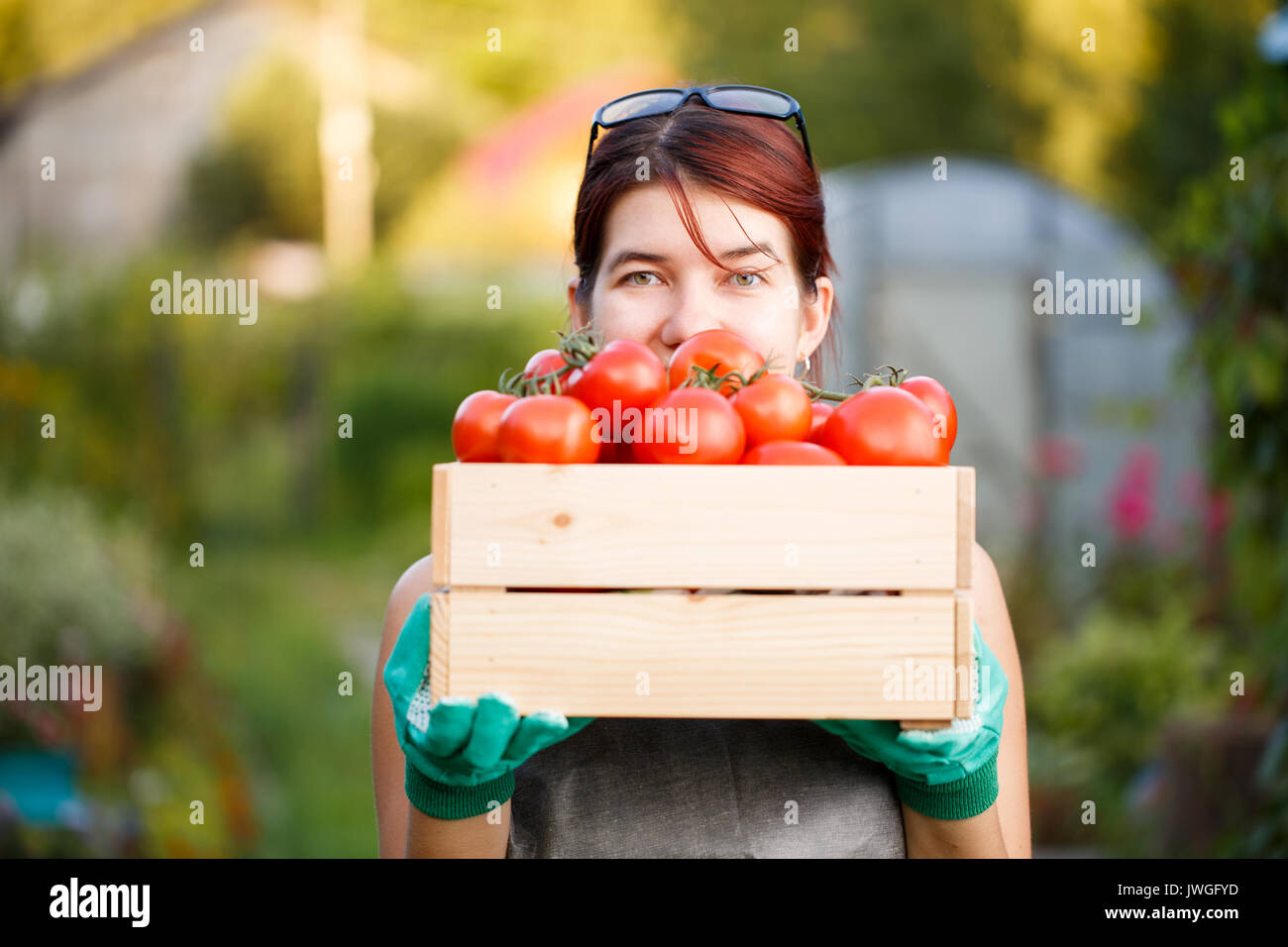 Image of girl with tomatoes Stock Photo - Alamy
