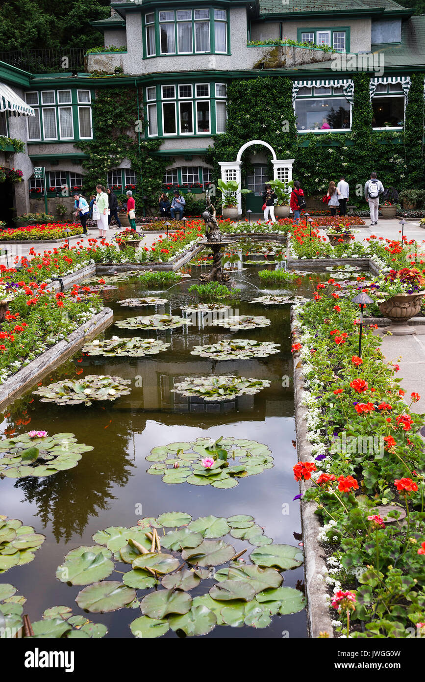 The Formal Italian Garden with Water Feature Planted Out with Red ...