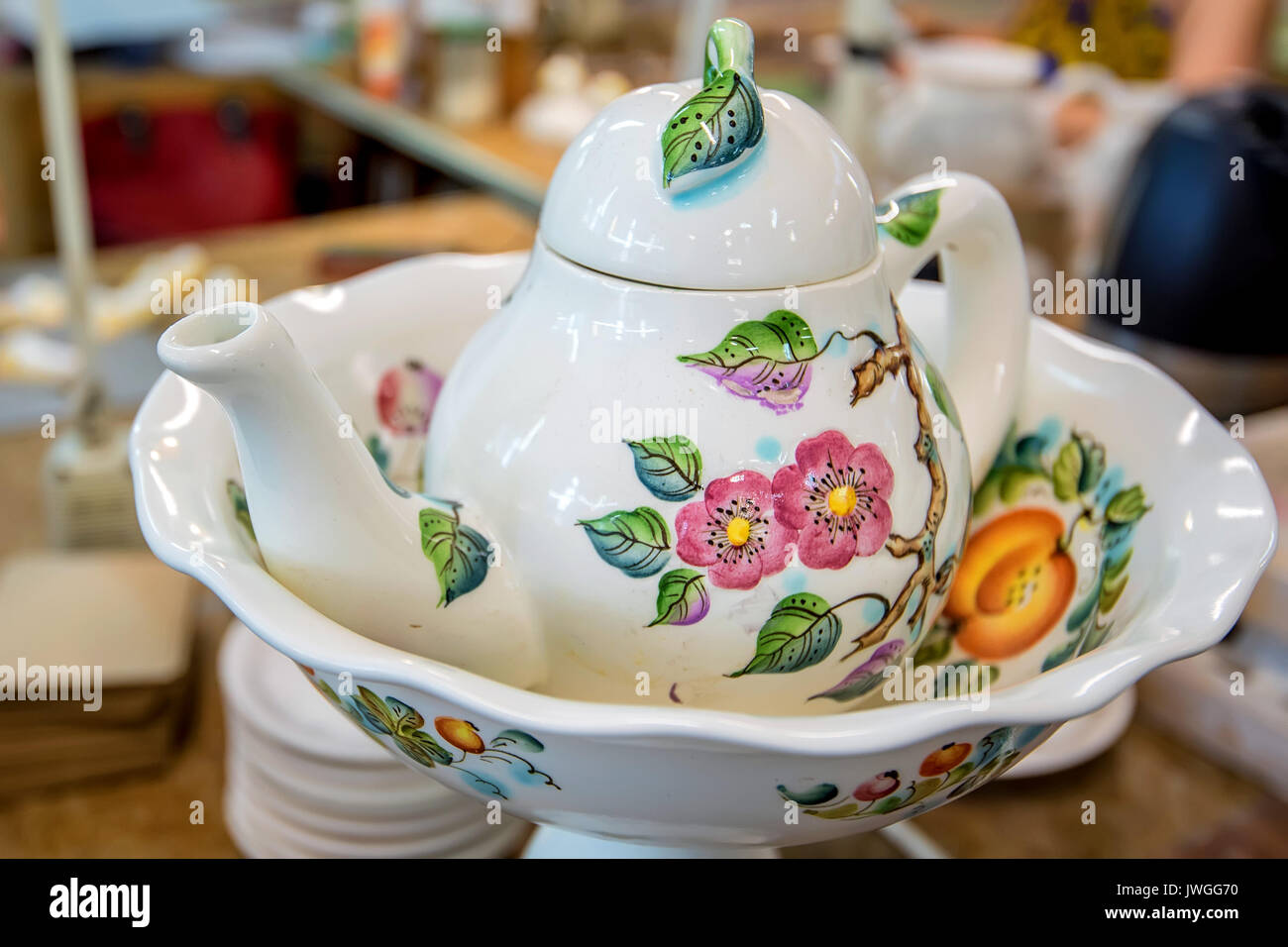 Beautiful delft teapot with flower painting Stock Photo - Alamy
