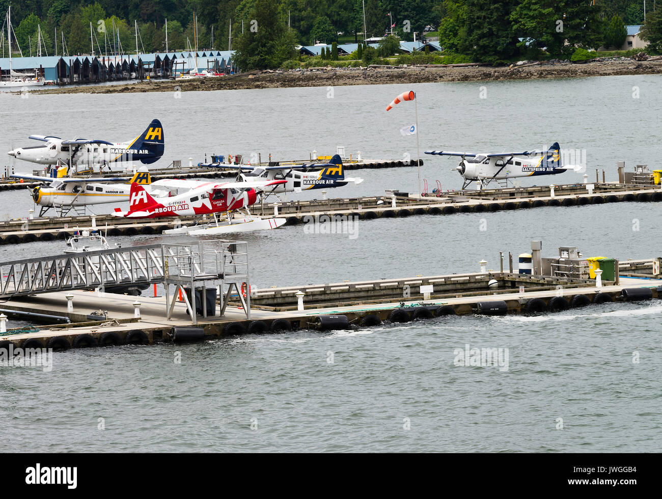 Harbour Air Seaplanes Docked at Landing Stage Platforms on Water In ...