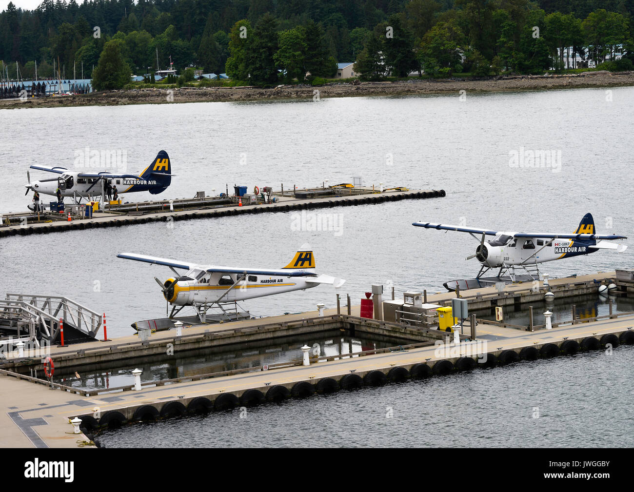 Harbour Air Seaplanes Docked at Landing Stage Platforms on Water In ...