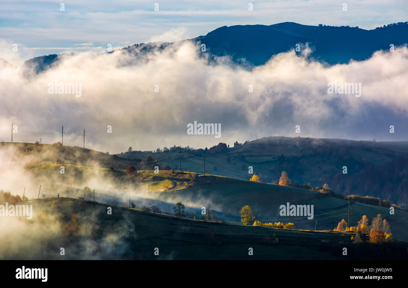 Fog over hill hi-res stock photography and images - Alamy
