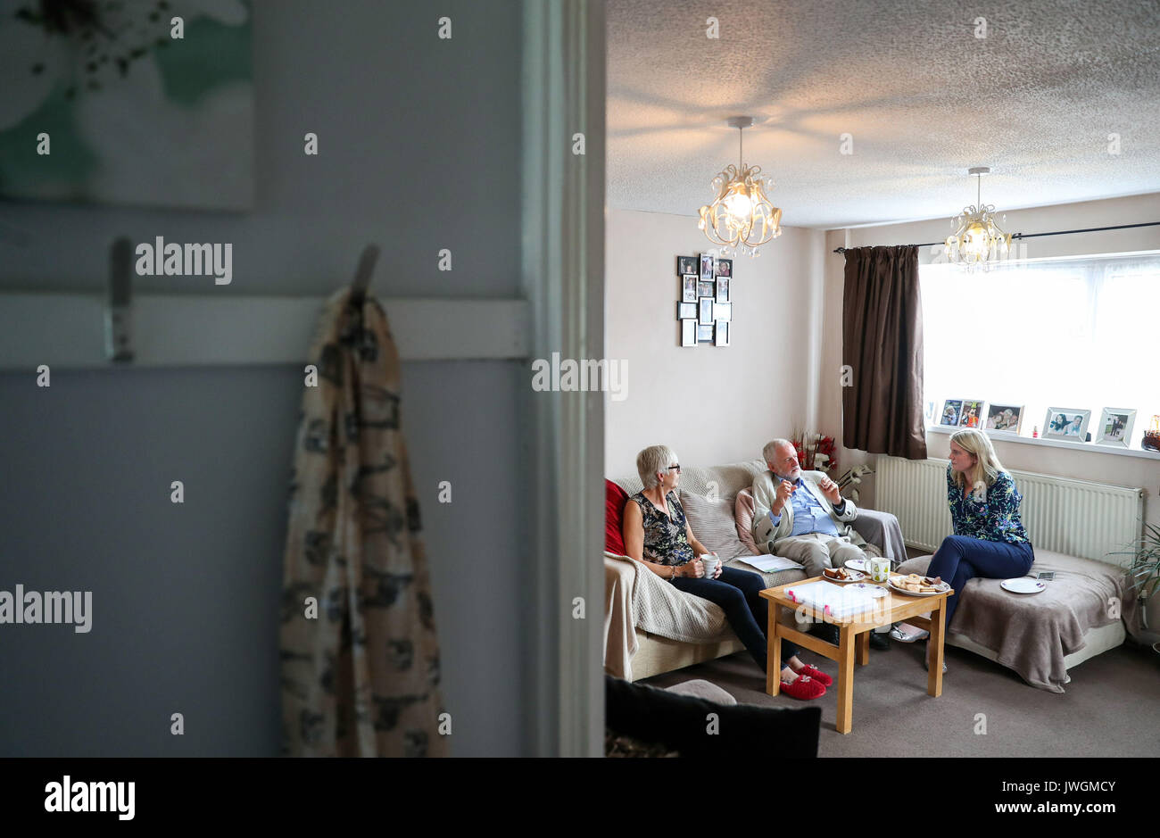 Labour leader Jeremy Corbyn and councillor Rachel Eden (right) speak to ...