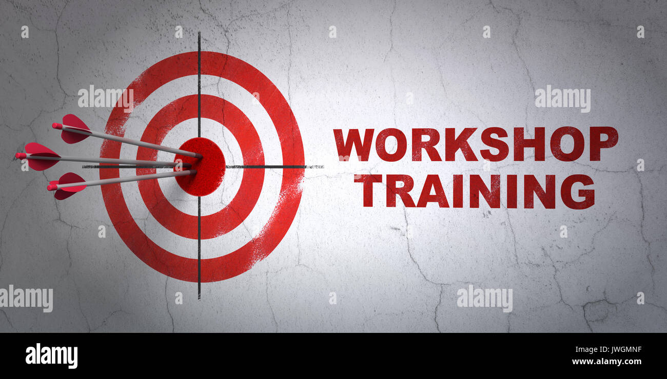 Education concept: target and Workshop Training on wall background ...