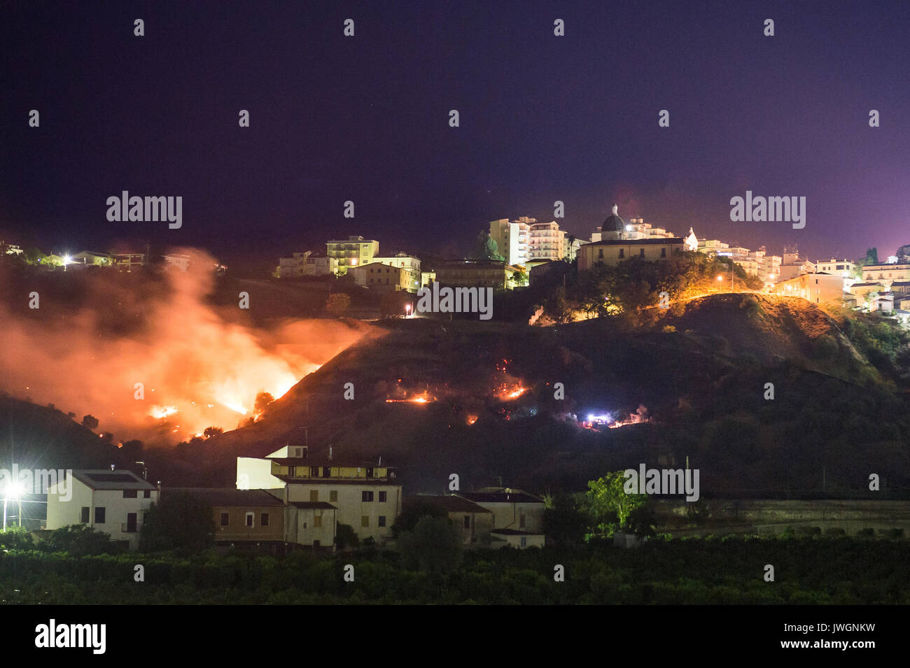A vast fire threatens the ancient village of Corigliano Calabro in ...