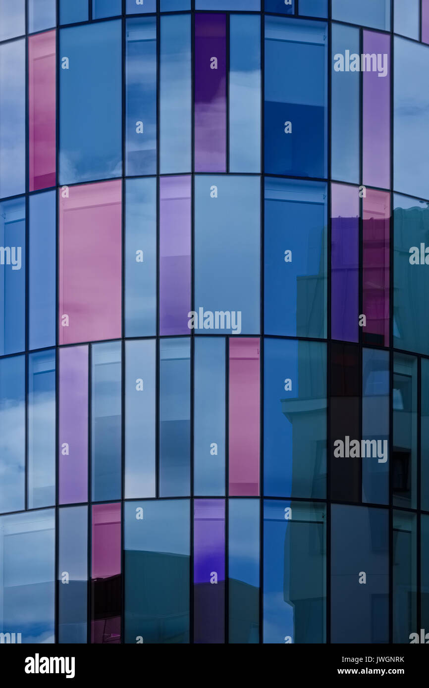 An abstract close-up of a section of a glass facade of a modern ...