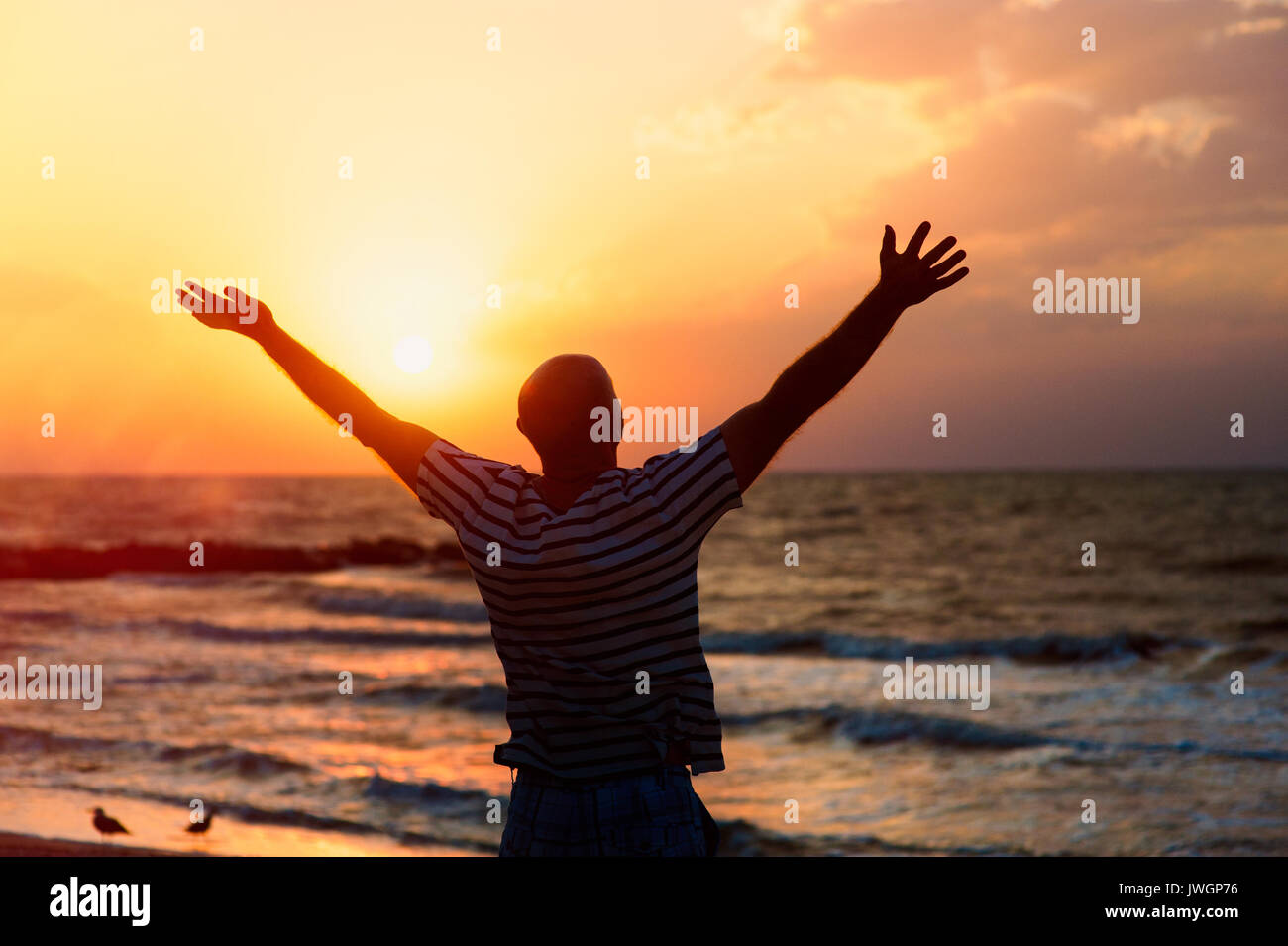 People pray on beach High Resolution Stock Photography and Images - Alamy