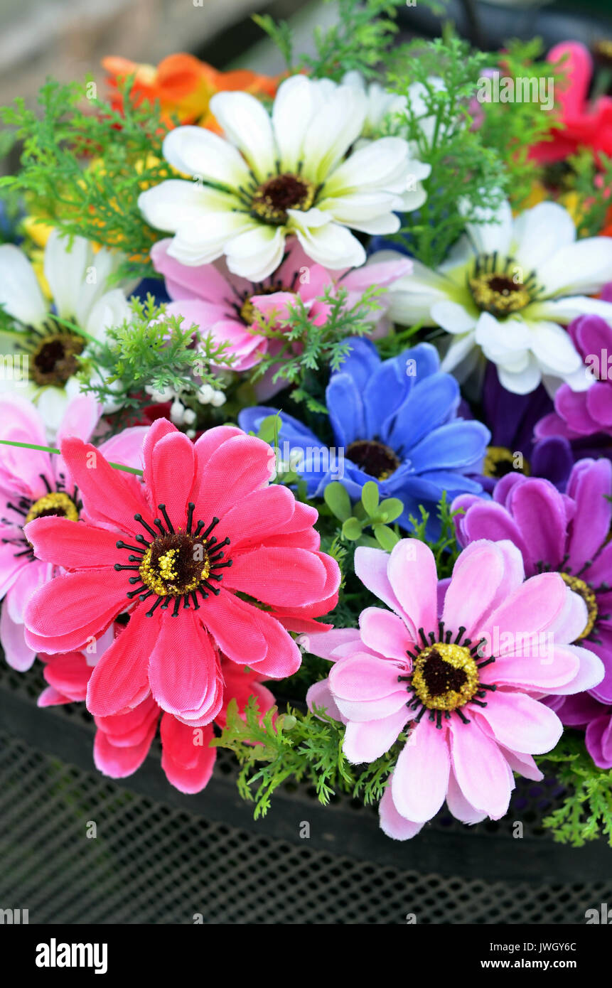 Bright and beautiful colors of plastic flowers Stock Photo - Alamy
