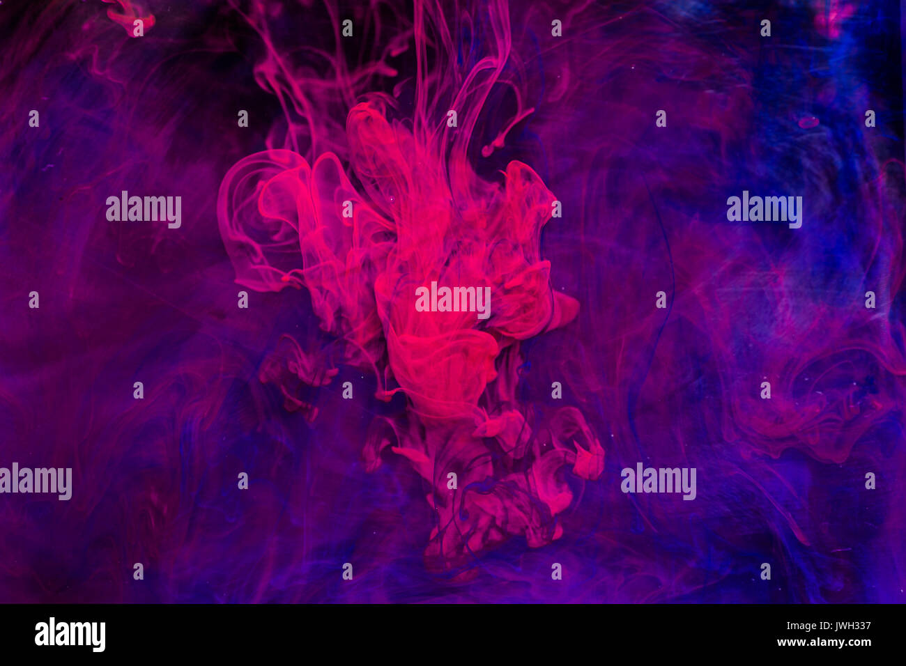 Ink in water Stock Photo - Alamy