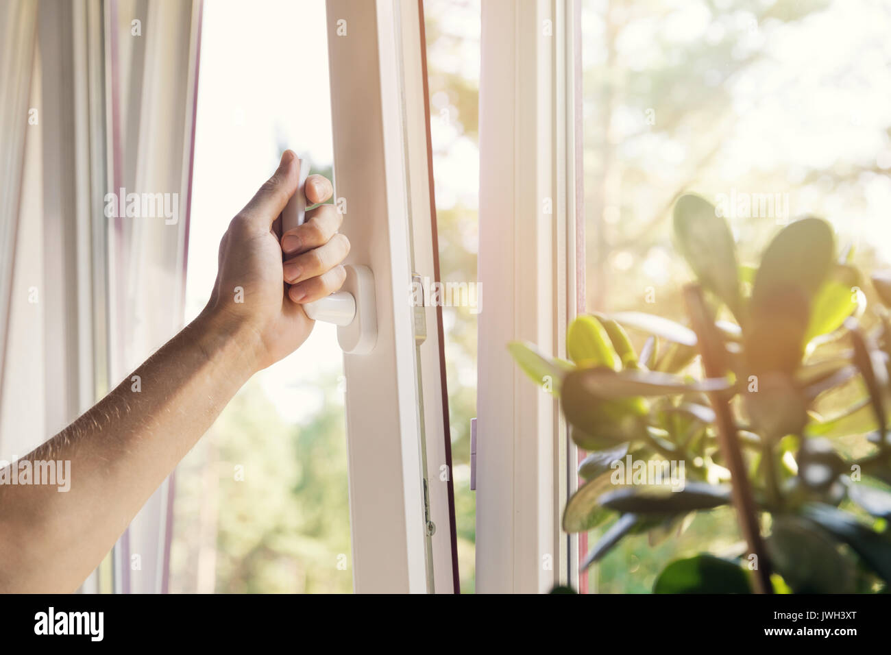 hand open white plastic pvc window at home Stock Photo - Alamy