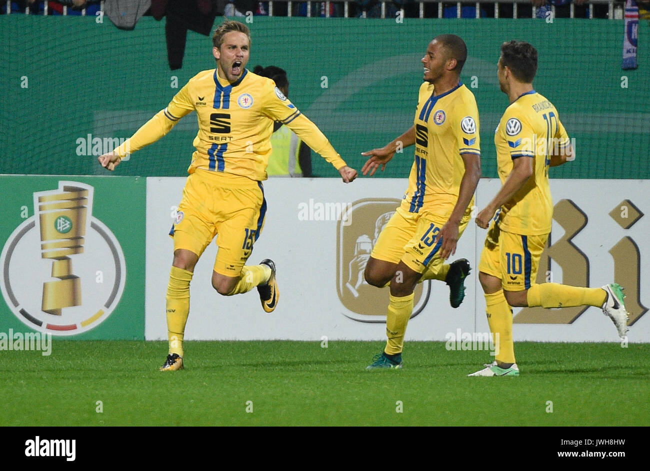 Kiel, Germany. 11th Aug, 2017. Braunschweig's Christoffer Nyman (L ...
