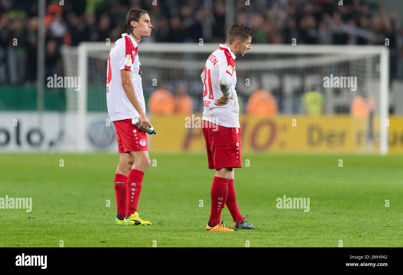 Essen, Germany. 11th Aug, 2017. Essen's Benjamin Baier (R) and Philipp ...