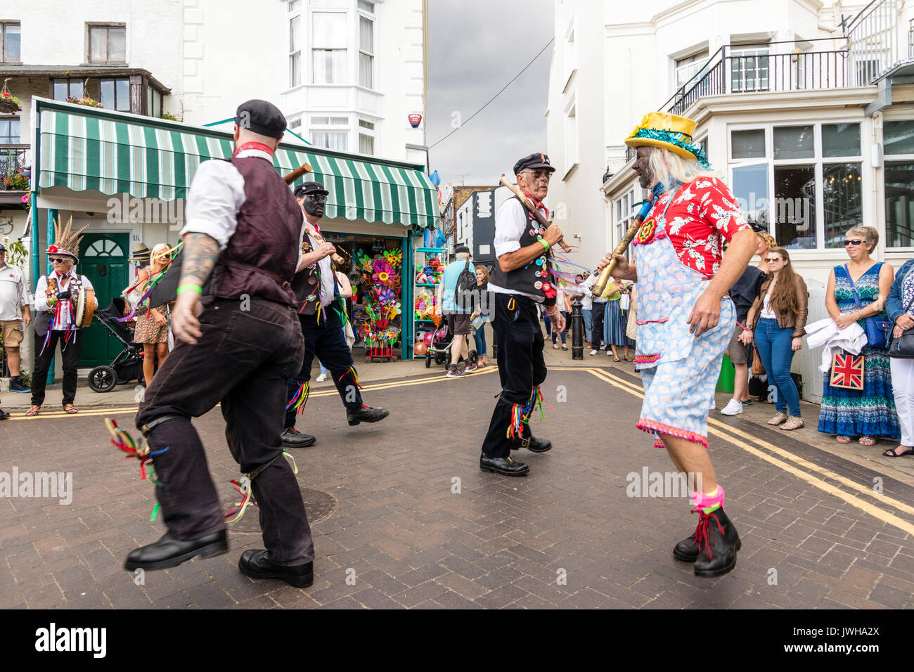 Traditional Morris dancers, Dead Horse Morris dancing in small square ...