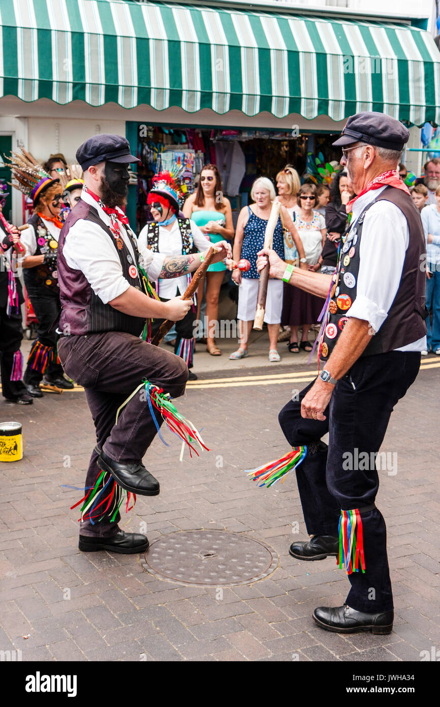 Traditional folk dancers, Dead Horse Morris, dancing in small public ...