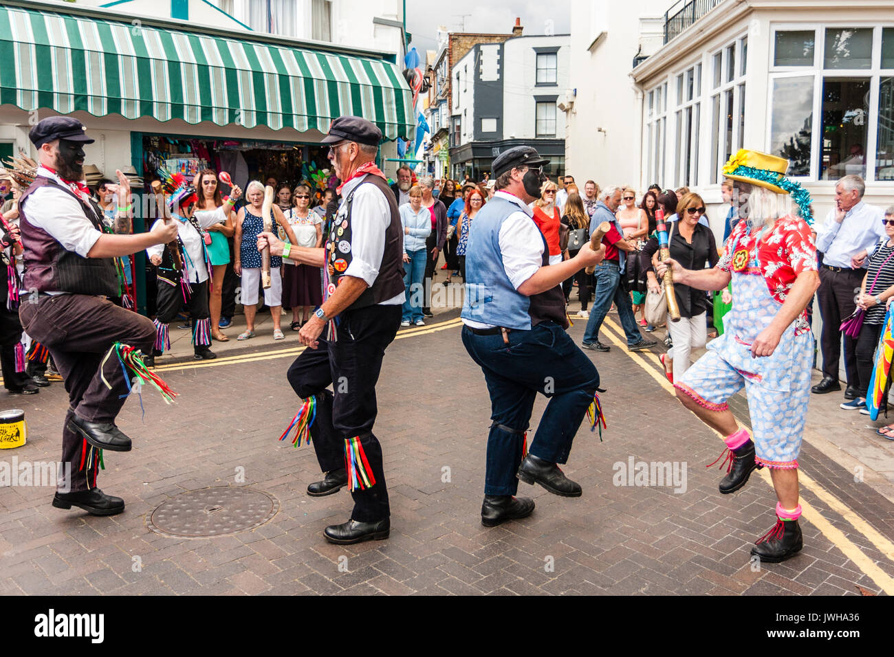 Traditional Morris dancers, Dead Horse Morris dancing in small square ...