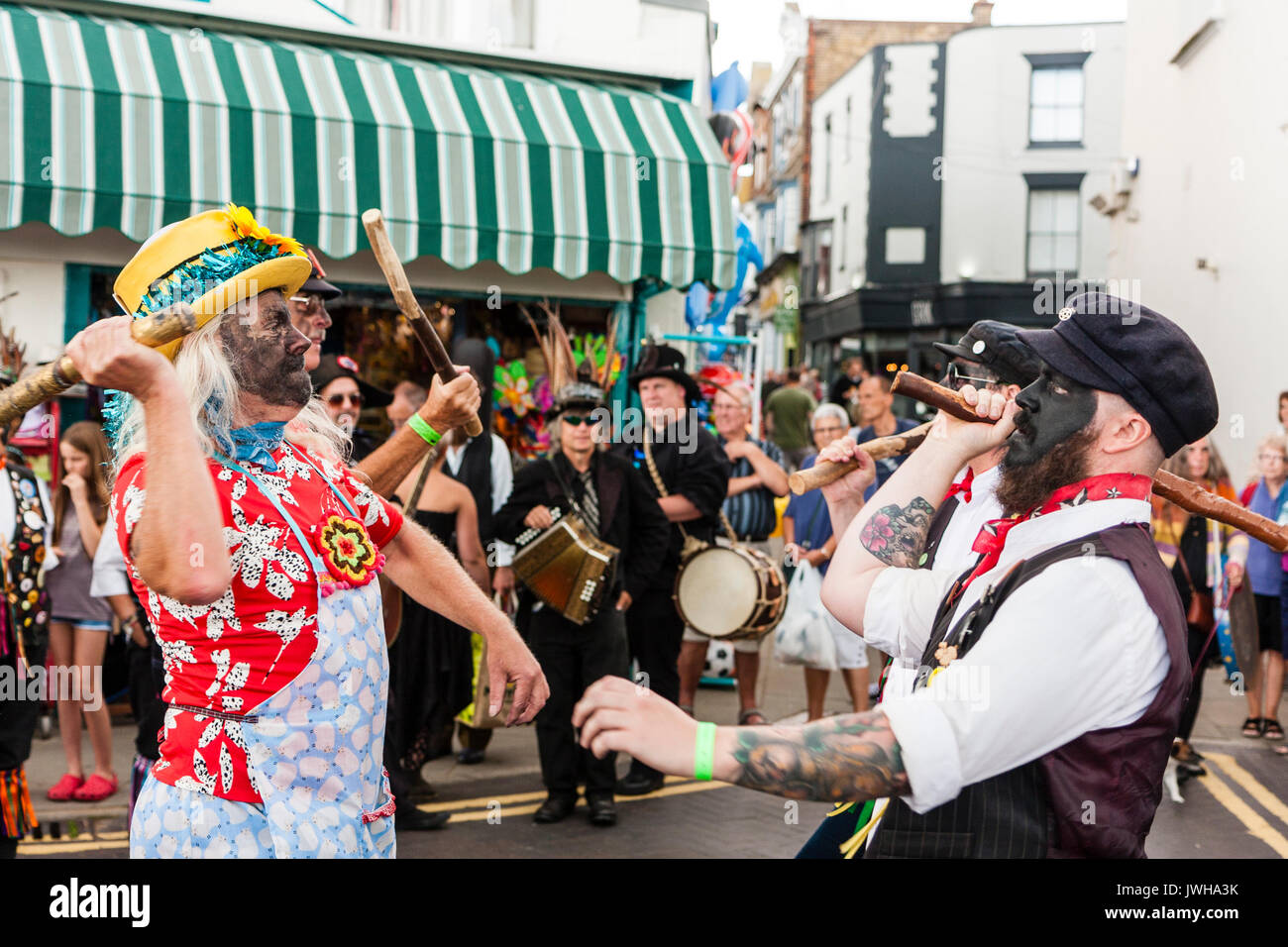 Traditional Morris dancers, Dead Horse Morris dancing in small square ...
