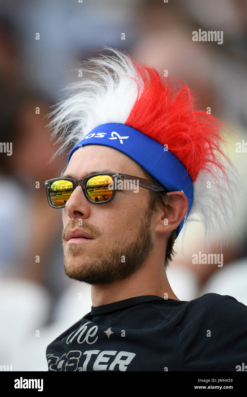 London, UK. 12 August 2017. A French fan watches the decathlon pole ...