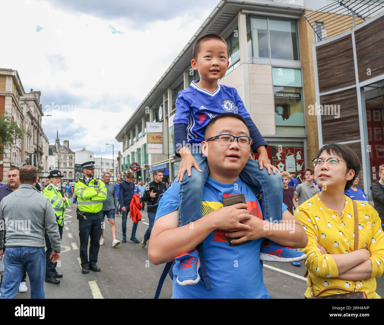 London, UK. 12th Aug, 2017. Football fans arrive for the season opener ...