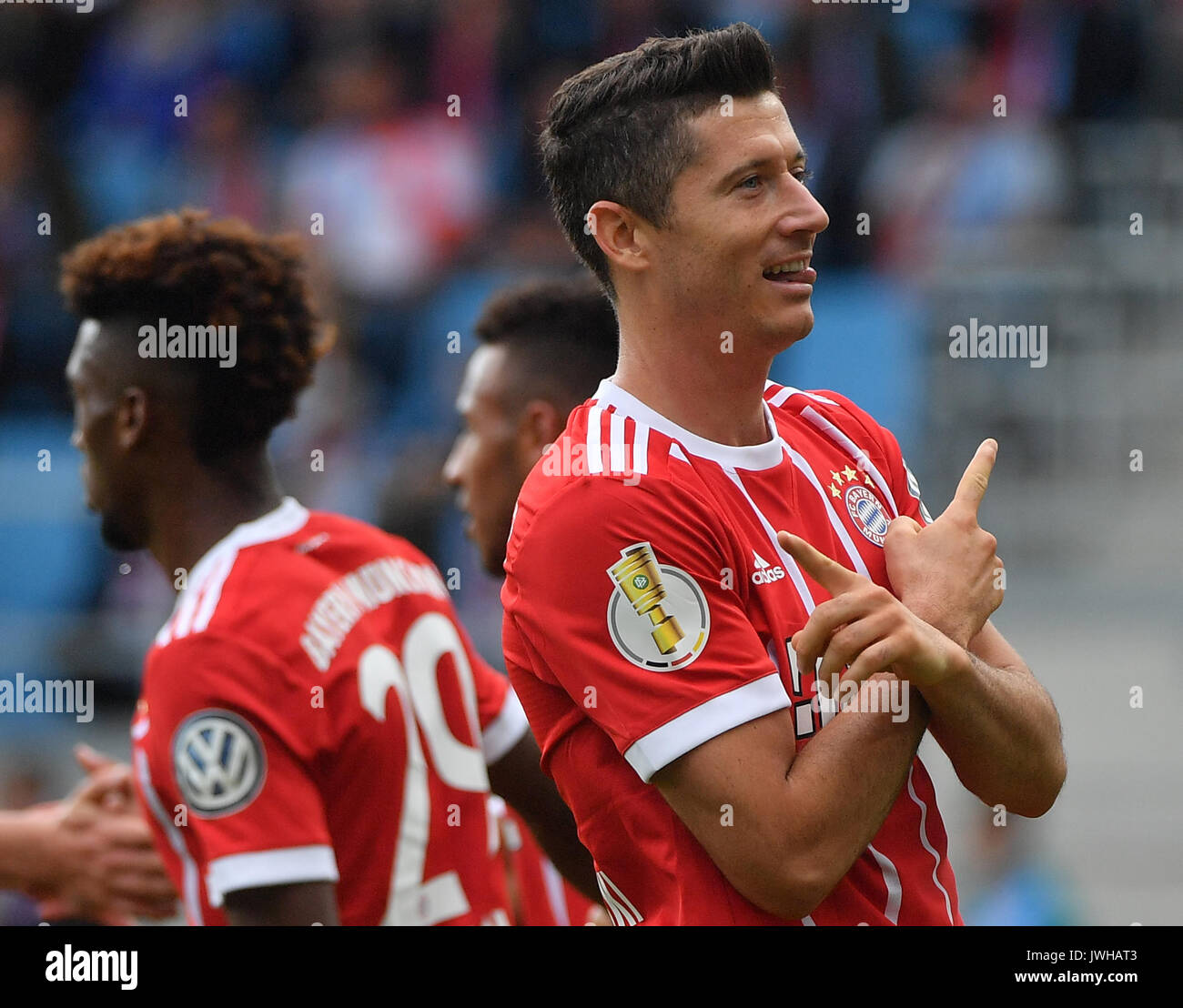 Munich's Robert Lewandowski celebrates after giving his side a 3:0 lead ...