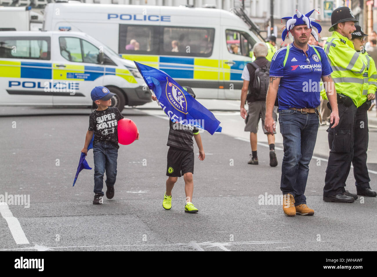London, UK. 12th Aug, 2017. Football fans arrive for the season opener ...