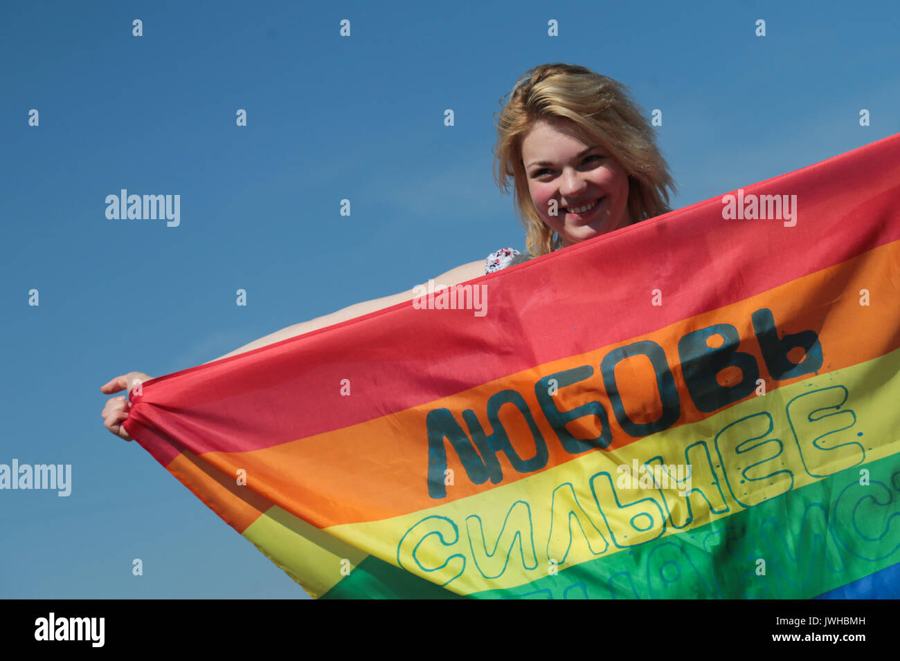 St. Petersburg, Russia. 12th Aug, 2017. A participant hold a rainbow ...