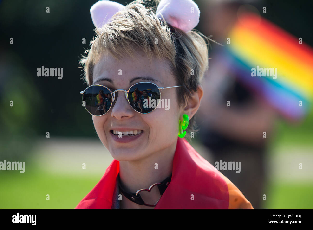 St. Petersburg, Russia. 12th Aug, 2017. People attending a rally are ...