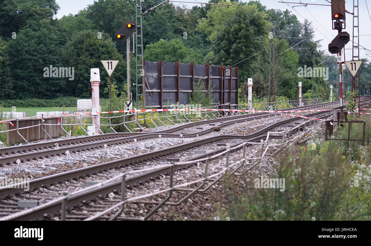 Niederbuehl, Germany. 12th Aug, 2017. Lowered rail tracks are being ...