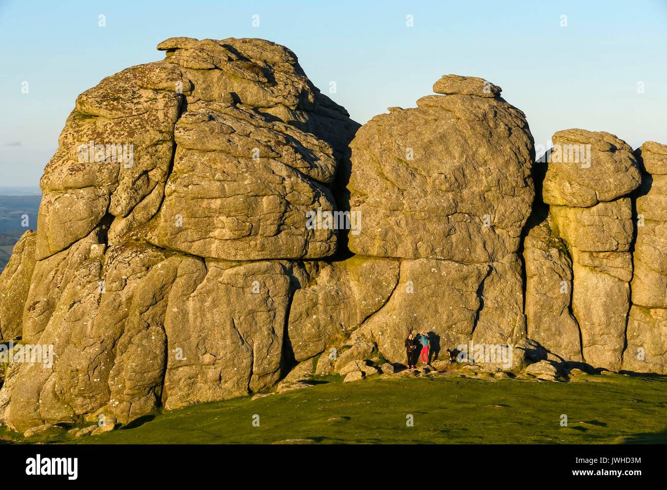 Haytor, Dartmoor, Devon, UK. 12th August 2017. UK Weather. Two people ...