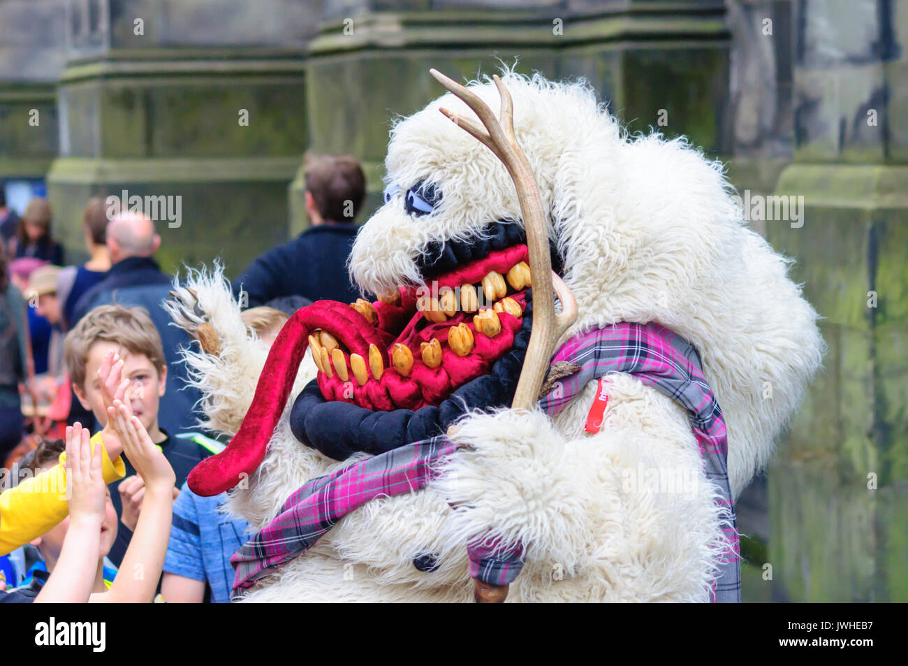 Edinburgh, Scotland, UK. 12th August, 2017. A giant monster performs on ...