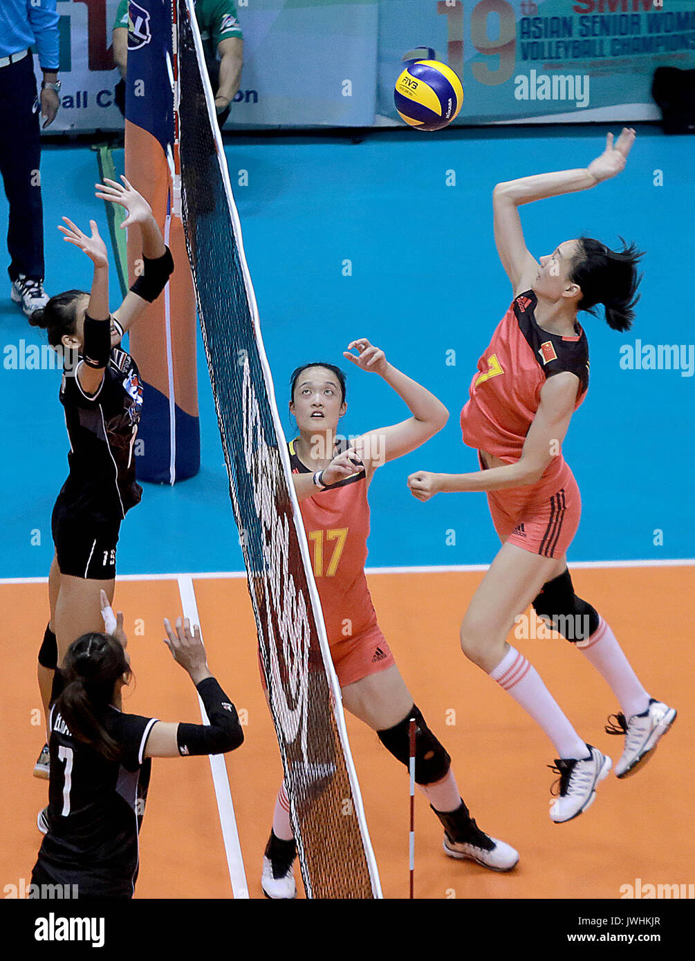 Laguna, Philippines. 13th Aug, 2017. Huang Ruilei (1st R) spikes during ...