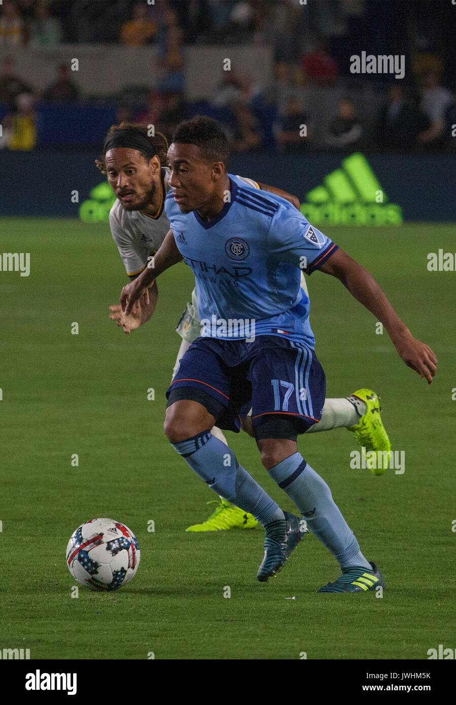 Carson, USA. 12th Aug, 2017. Jonathan Lewis (front) of the New York FC ...