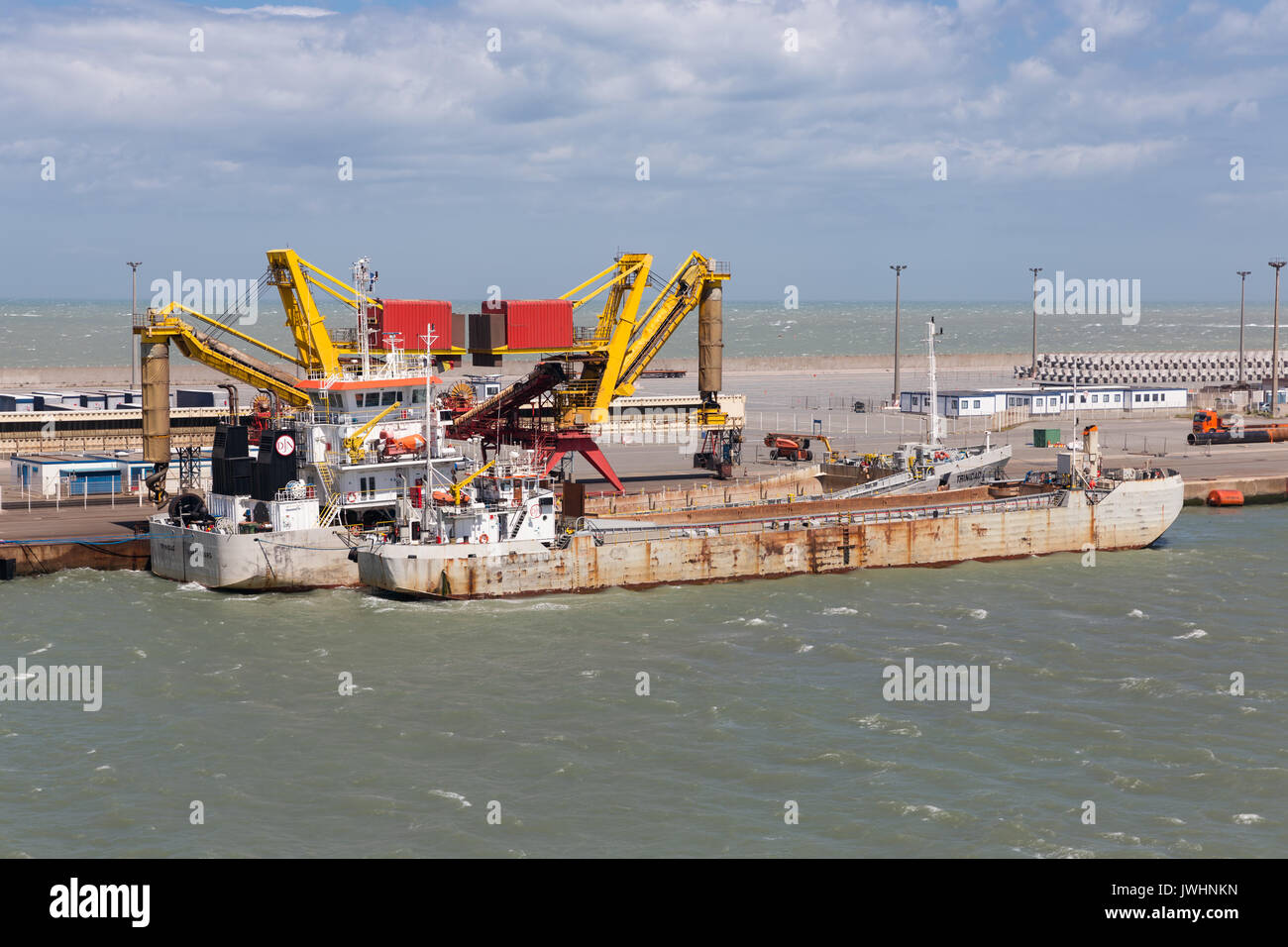 HARBOR CALAIS, FRANCE - JUNE 07, 2017: Carriers moored for loading and ...