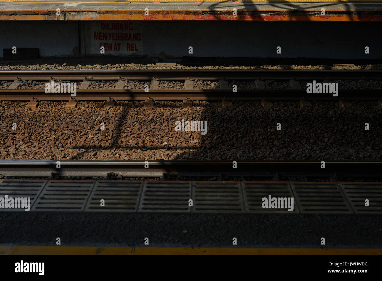 Rail and shadow Stock Photo - Alamy