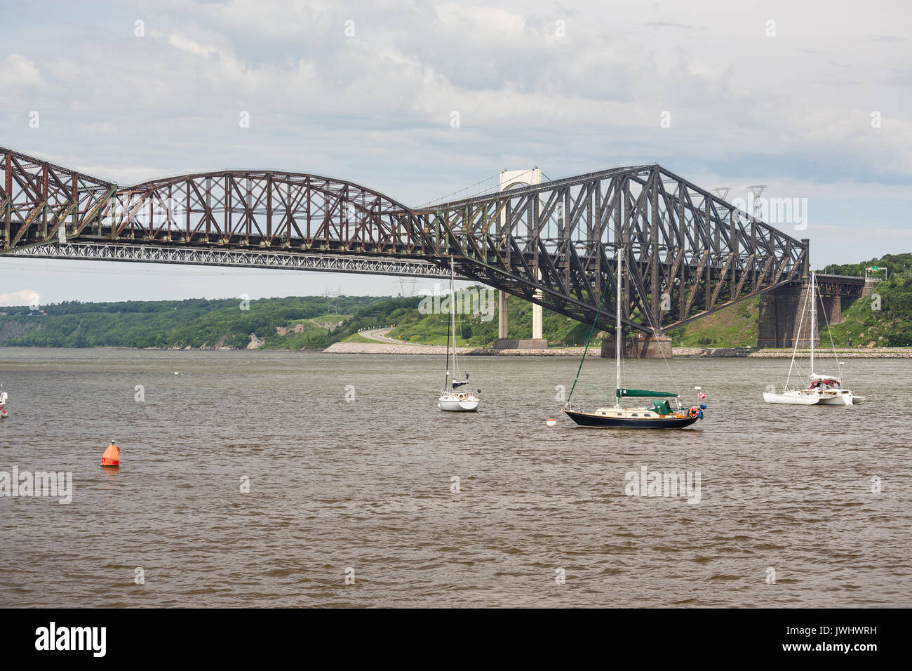 The Quebec Bridge is a riveted steel truss structure and is still the ...