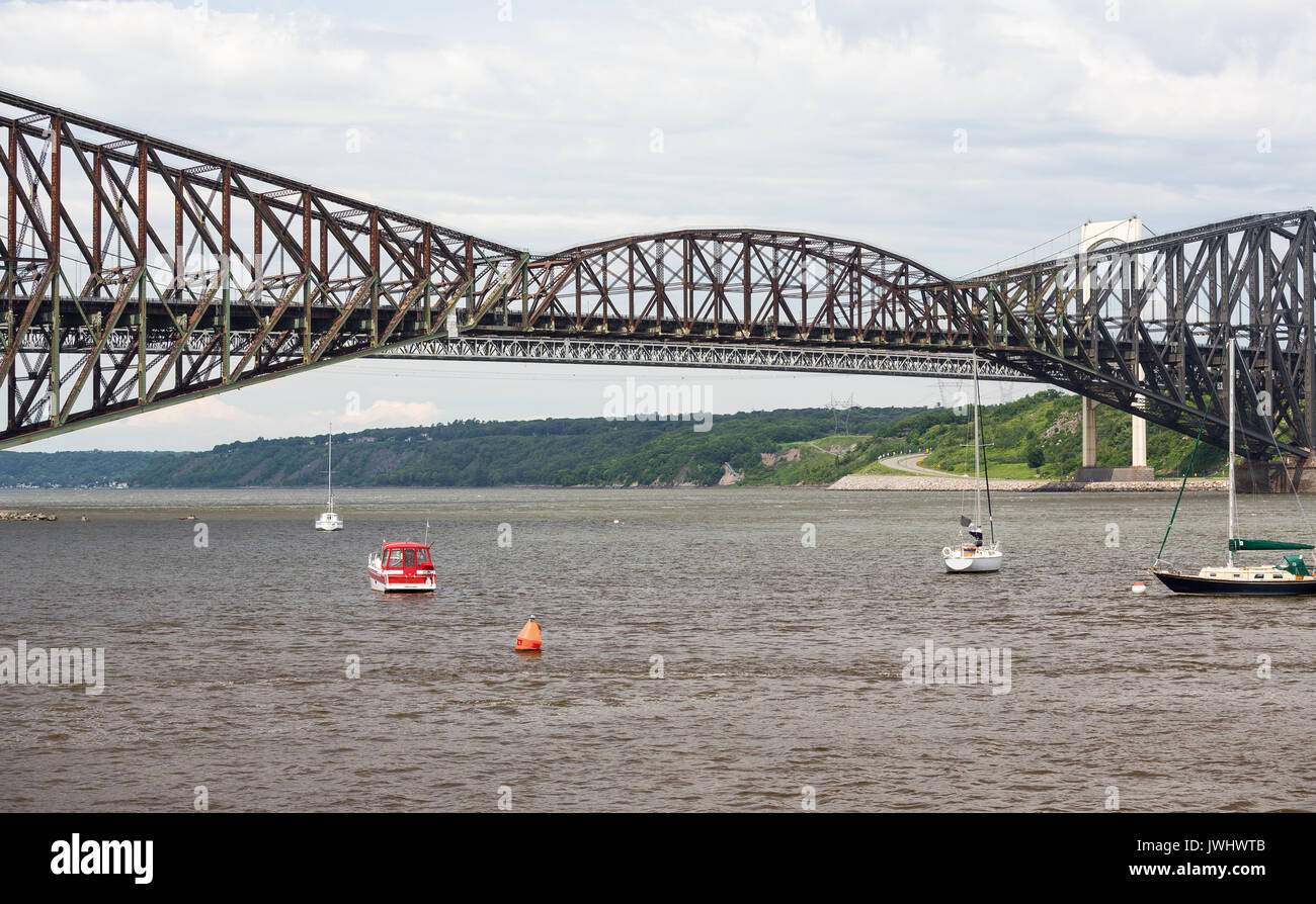 The Quebec Bridge is a riveted steel truss structure and is still the ...