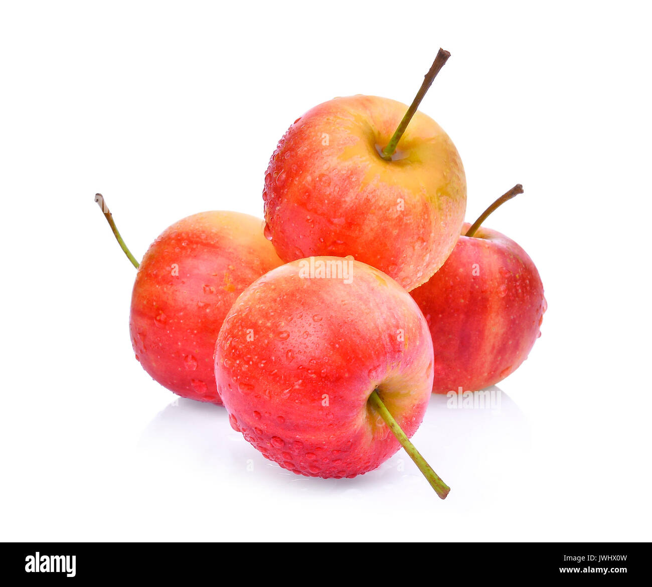 Dwarf Apple with drops of water isolated on white background Stock ...