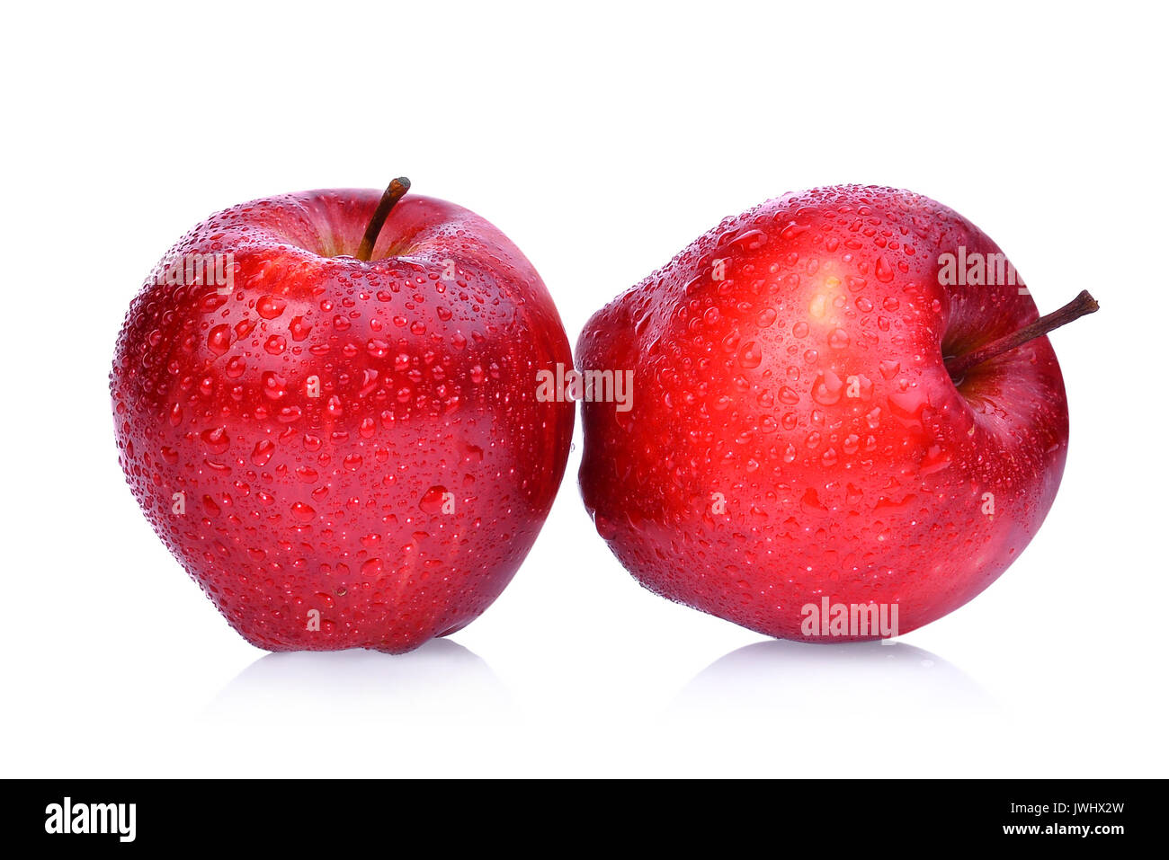 fresh red apples with drop of water isolated on white background Stock ...