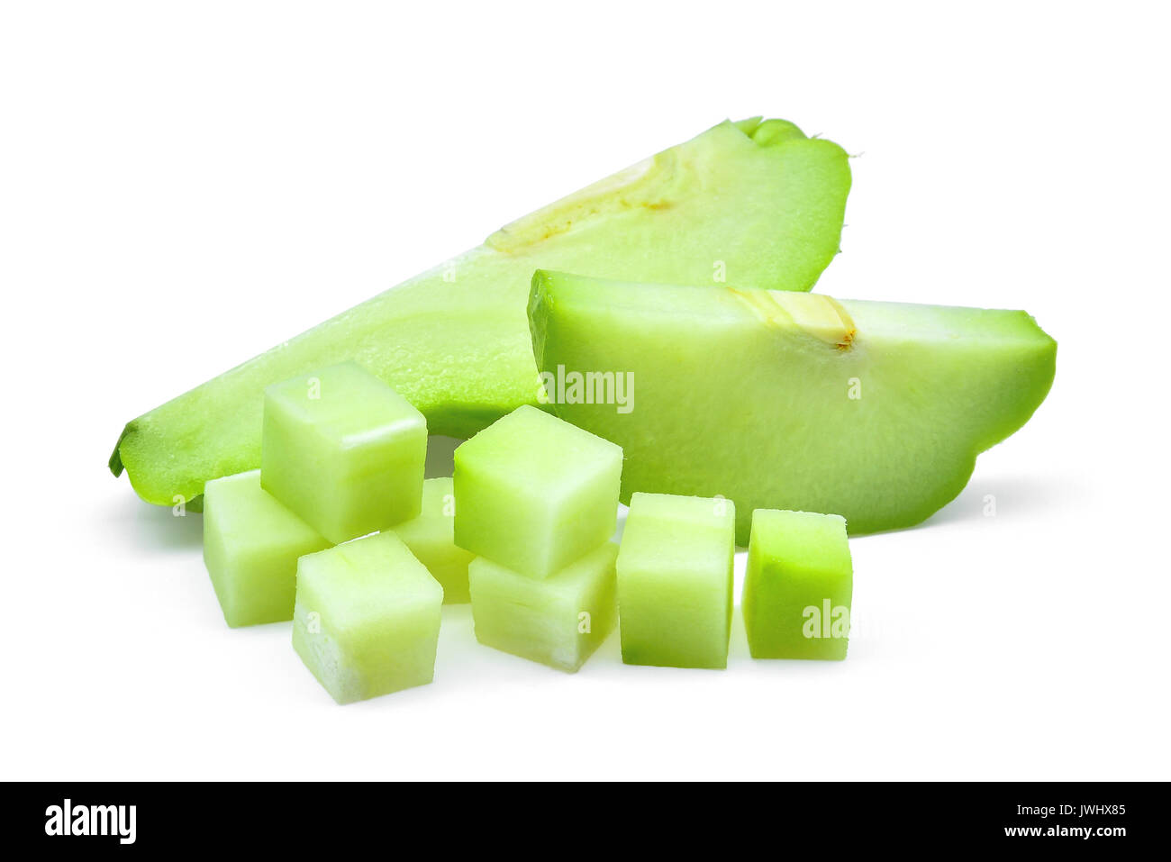 sliecd fresh chayote with cubes isolated on white background Stock ...