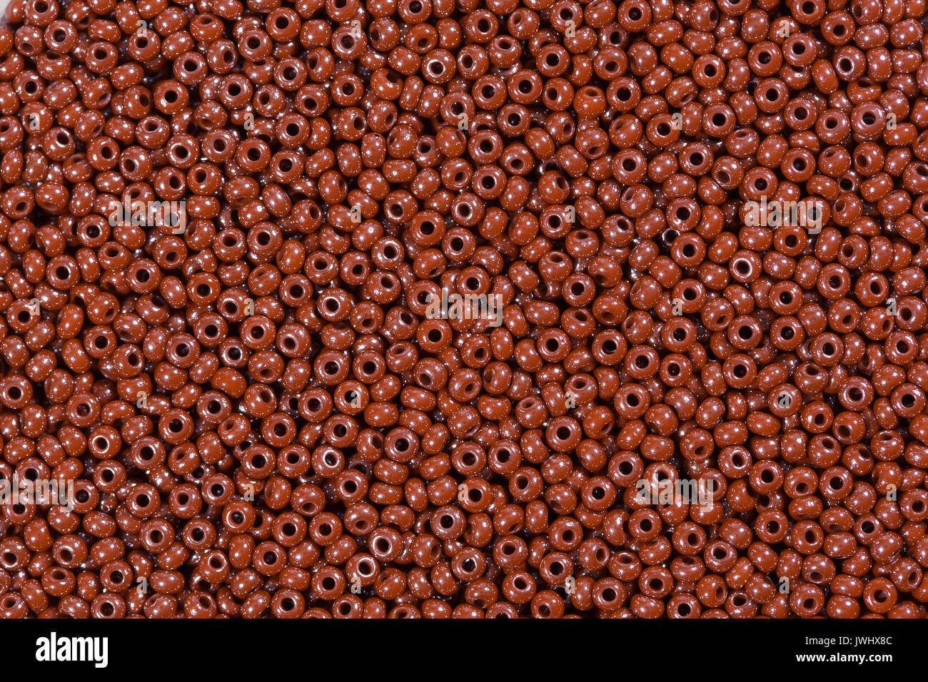 Brown beads texture on macro Stock Photo - Alamy