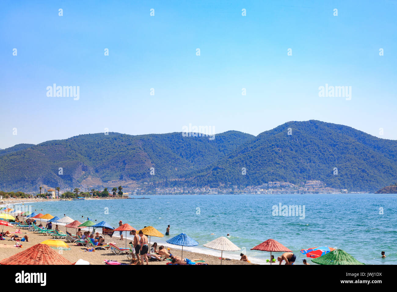 At Calis beach, Fethiye, Turkey- August 1, 2017: People at the Calis ...