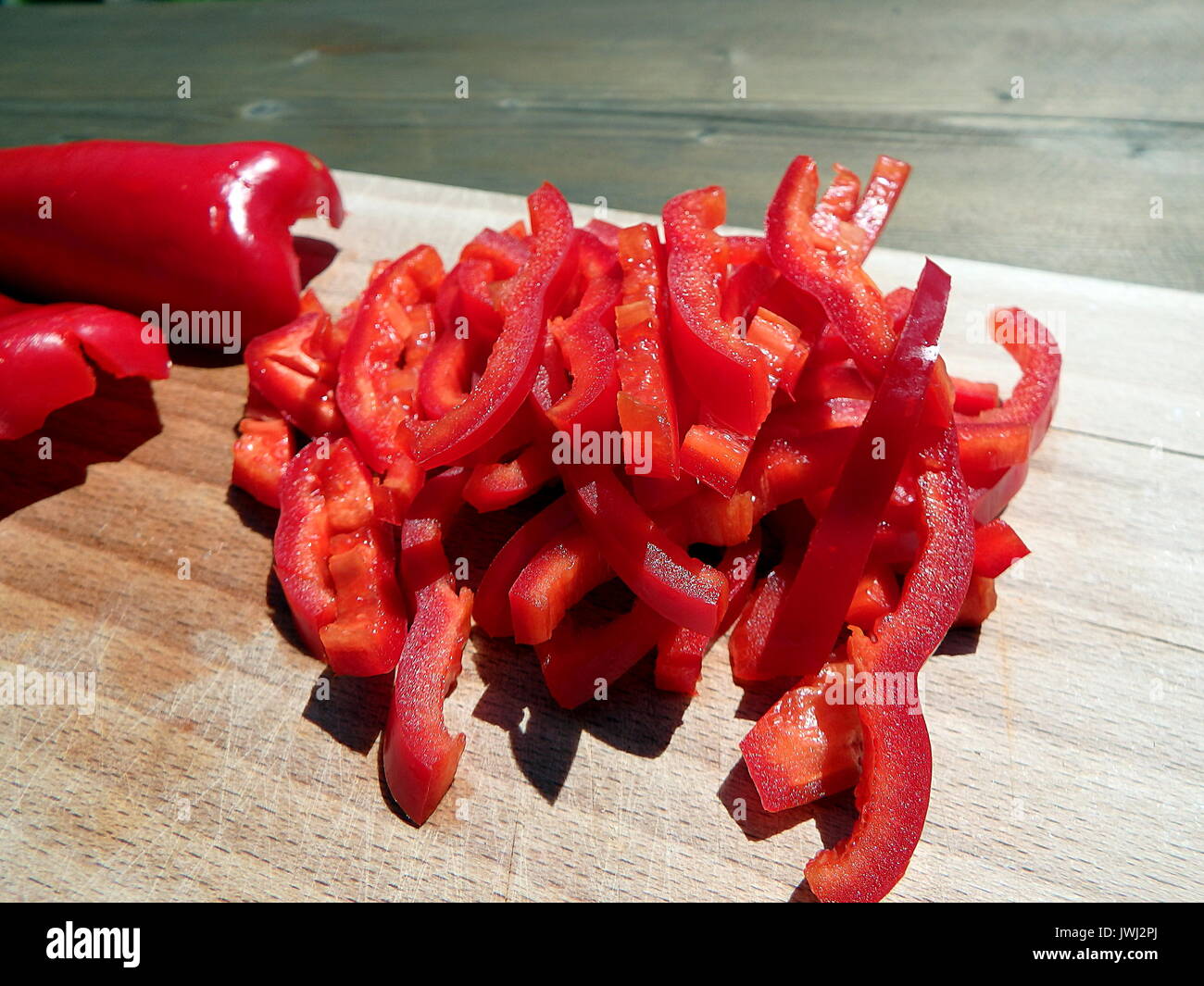 Red sweet pepper, Sliced red pepper Stock Photo - Alamy