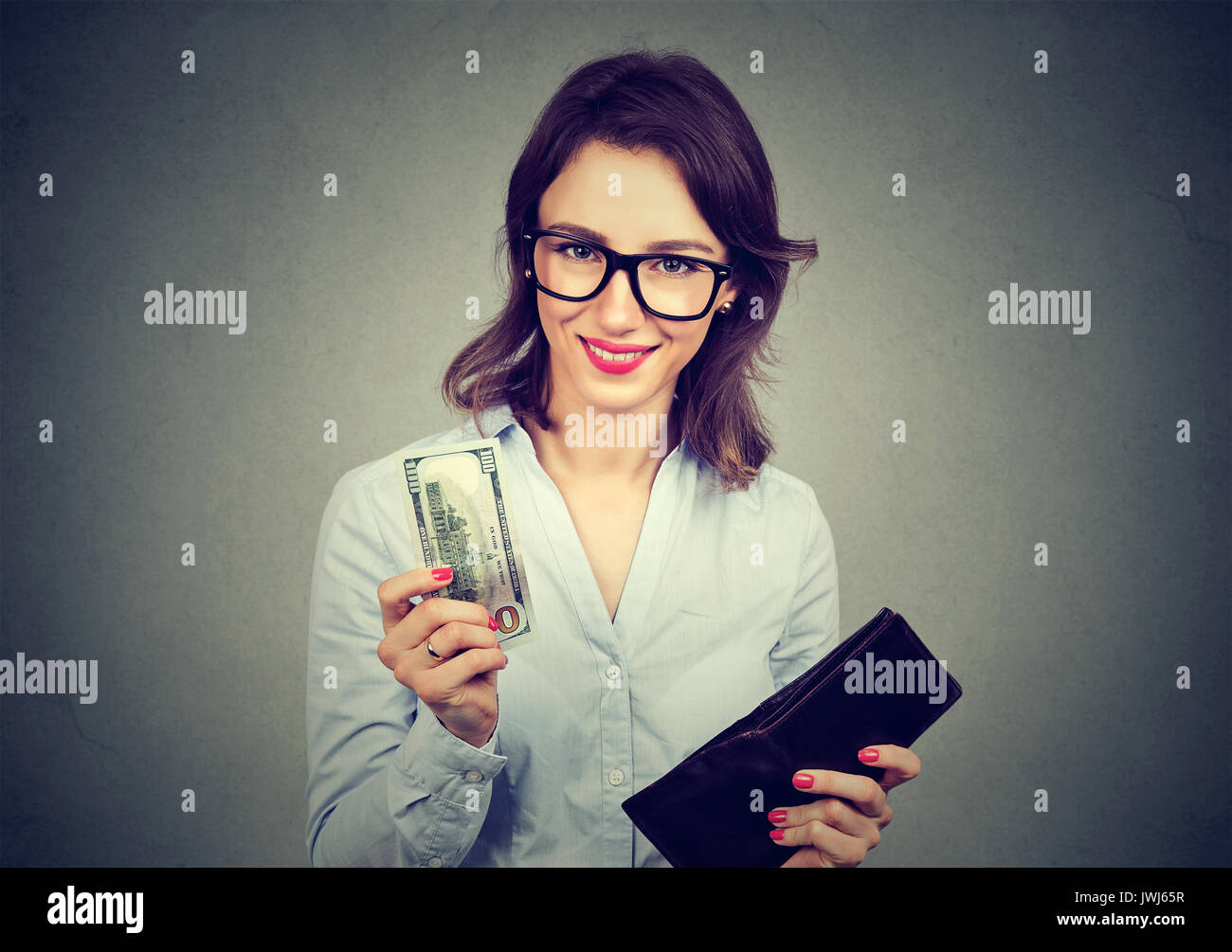 Girl paying money to bank hi-res stock photography and images - Alamy